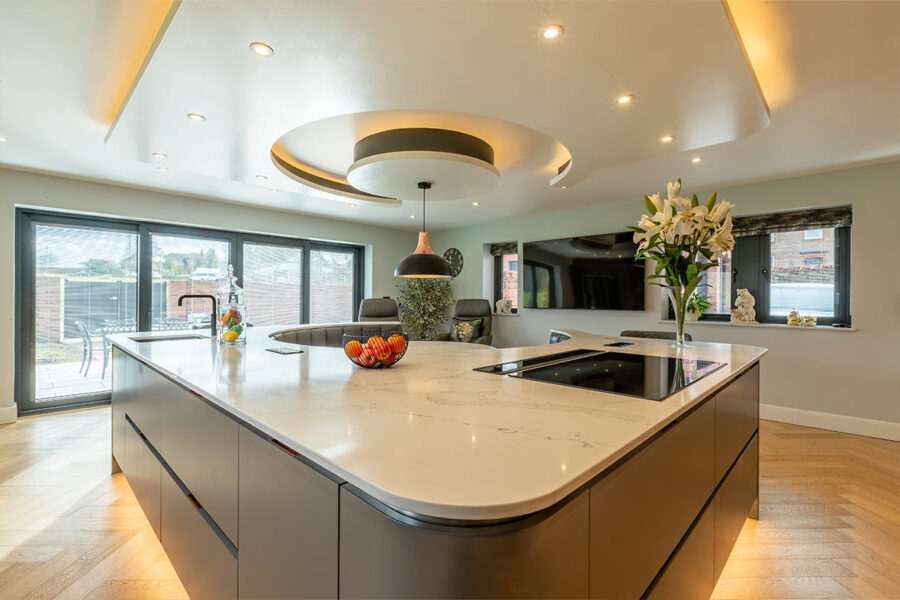 Handless kitchen design featuring island seating | Atlantis Kitchens